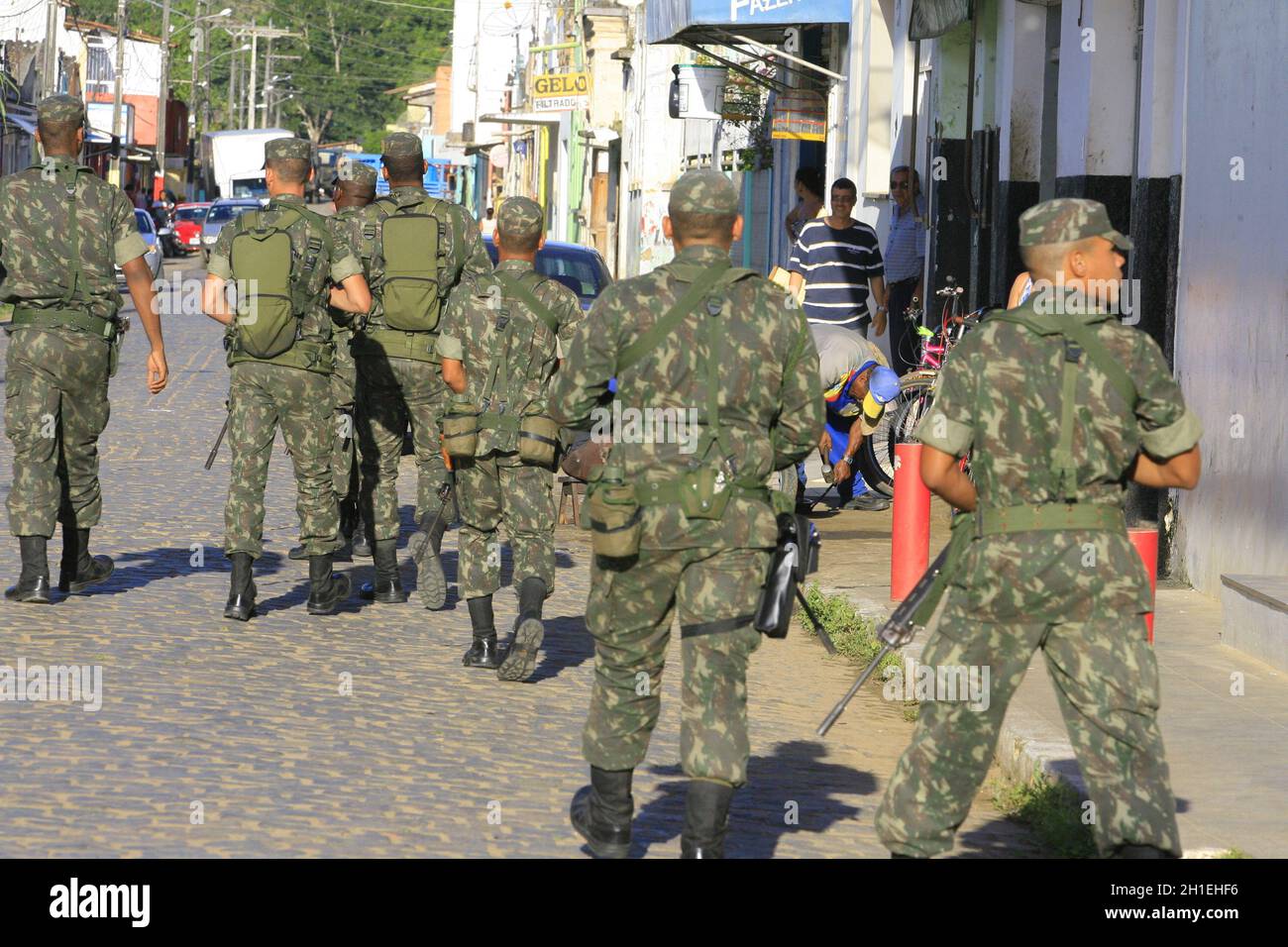 buerarema, bahia / brazil - february 14, 2014: Army soldiers patrol the ...