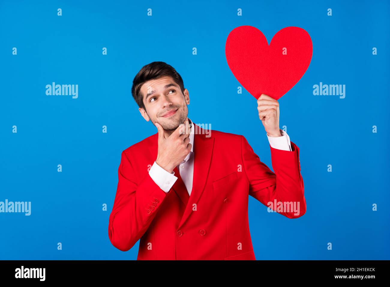 Photo of young man happy positive smile hand touch chin think look ...