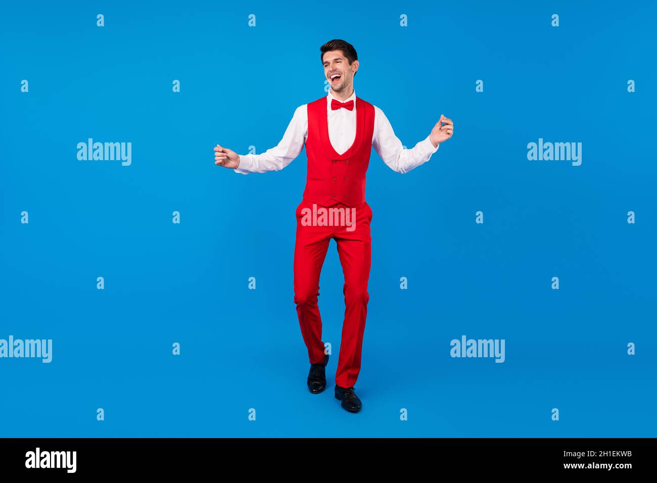 Full length photo of young man happy positive smile have fun event ...