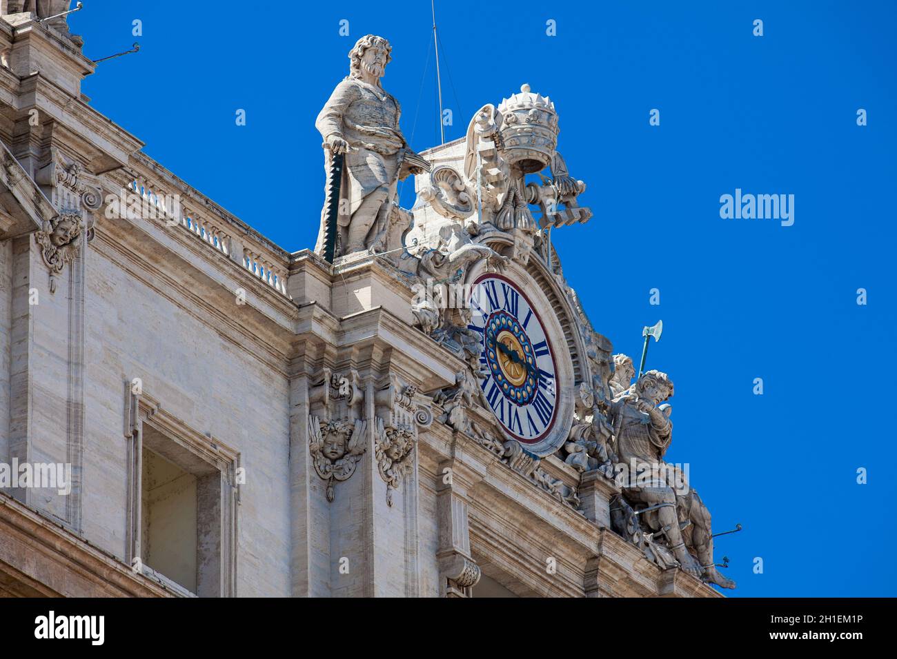 Detail of one of the clocks that crown the St. Peter Basilica on the Vatican City Stock Photo ...