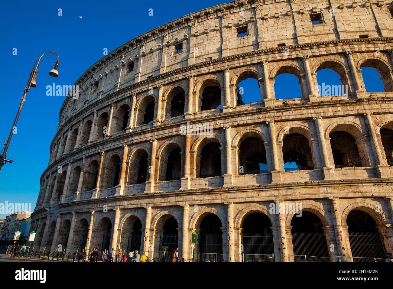 ROME, ITALY - APRIL, 2018: Tourists visiting the famous Colosseum under ...