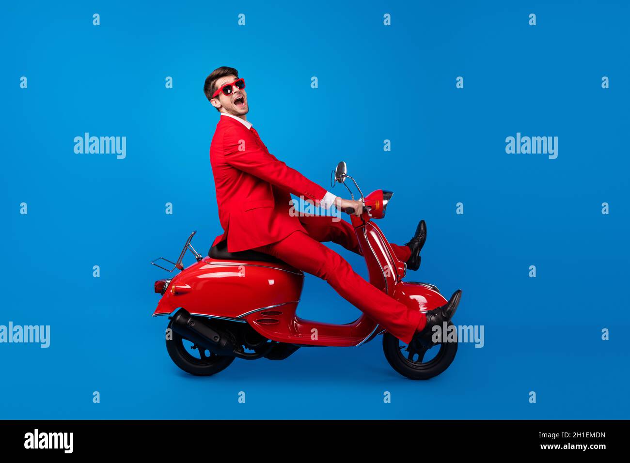 Full size profile side photo of young guy amazed shocked fast speed ...