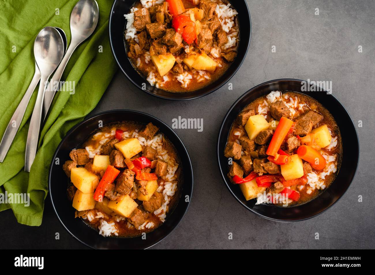Bowls of Mechado Filipino Beef Stew Served Over White Rice: Braised ...