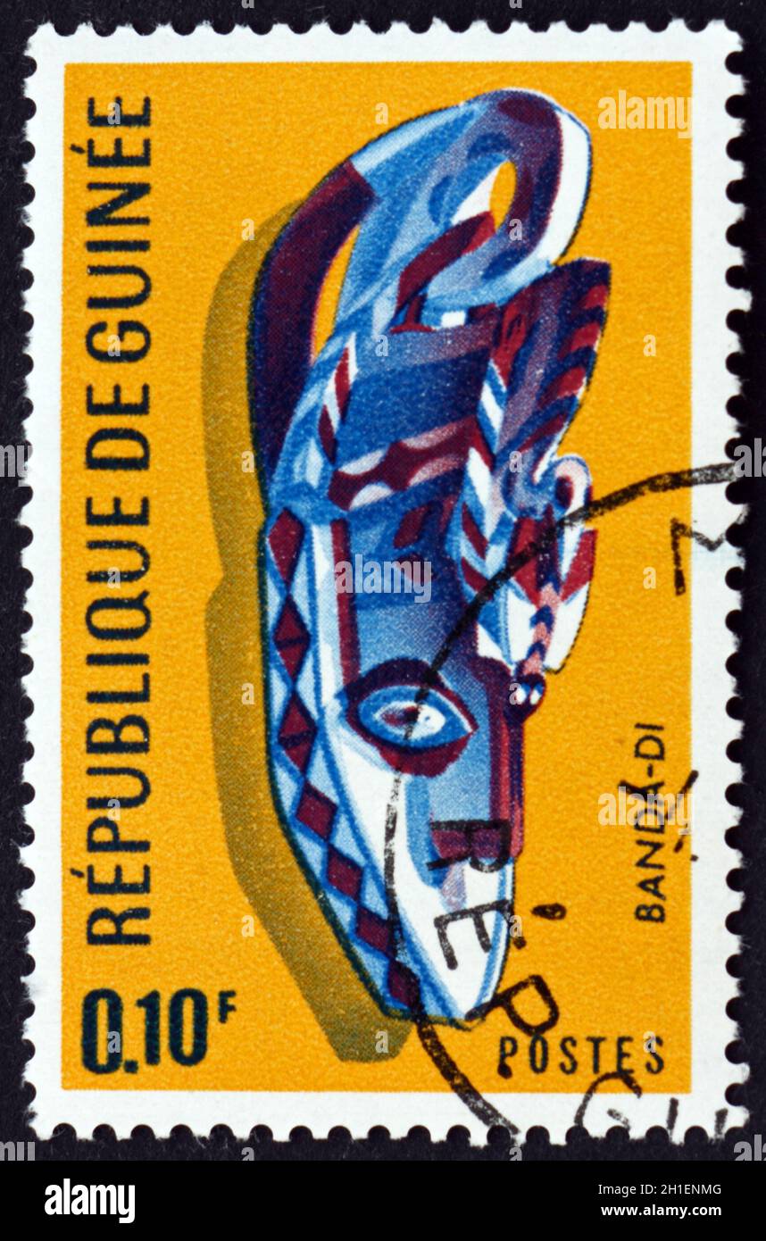GUINEA - CIRCA 1967: a stamp printed in Guinea shows Small Banda Mask ...