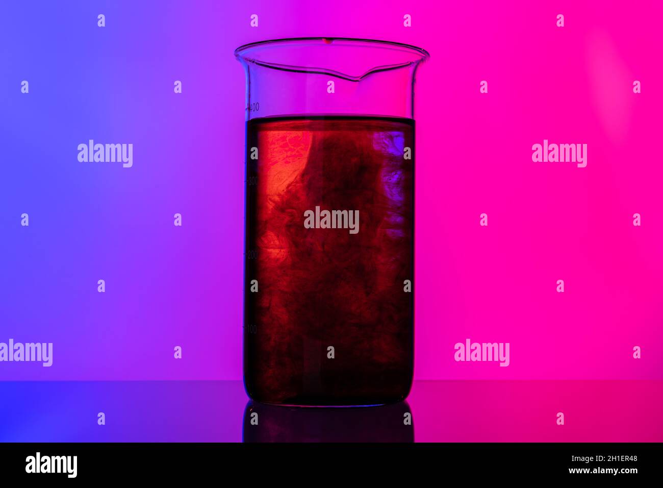 Laboratory glass tubes with chemicals on bright pink background Stock ...