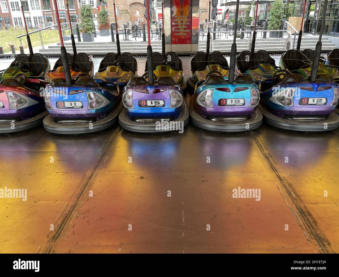 Closeup shot of bumper cars parked in a line in the fun fair Stock ...