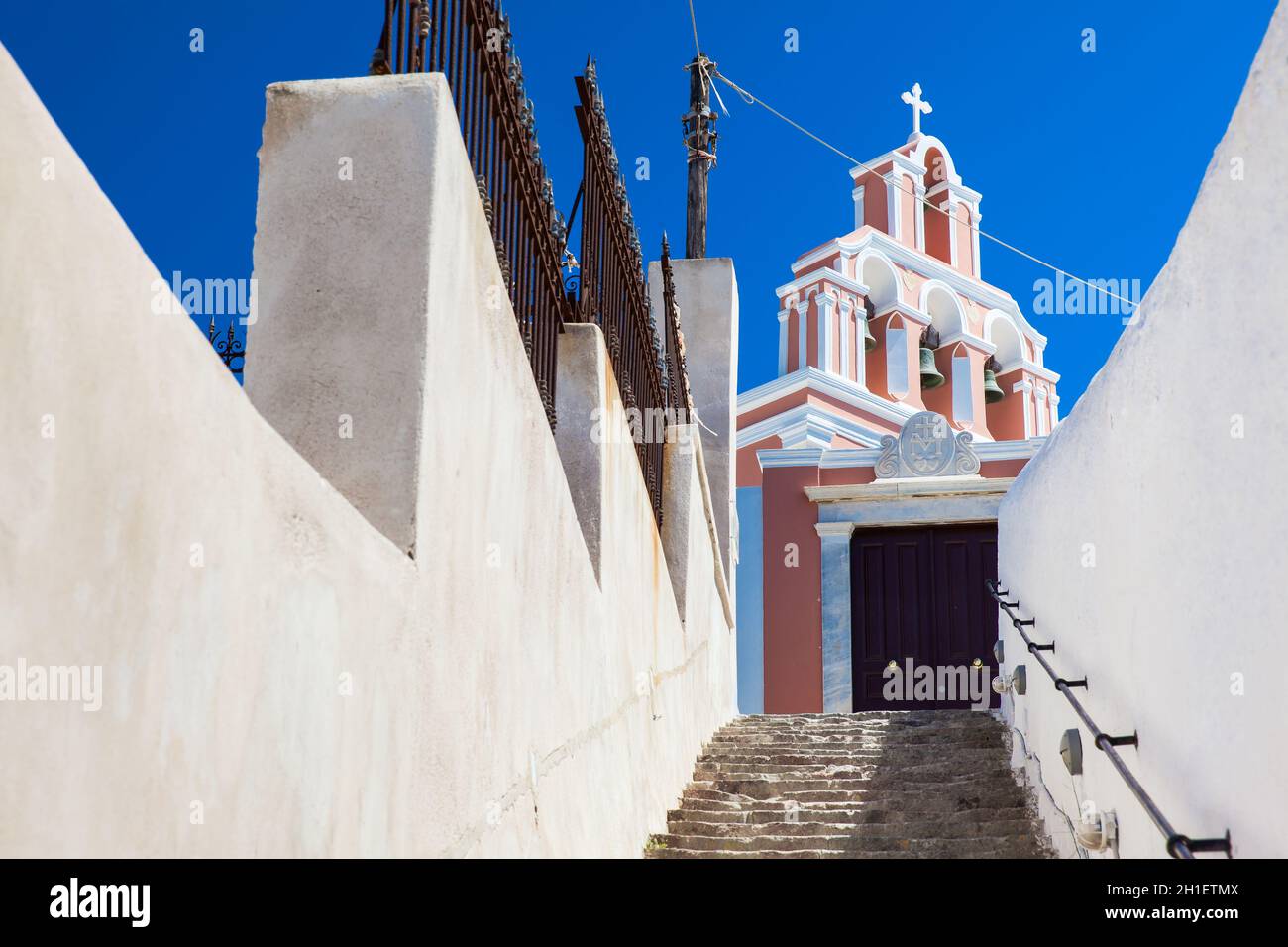 Bell tower of the Catholic Monastery of Dominican Nuns at Fira City in ...