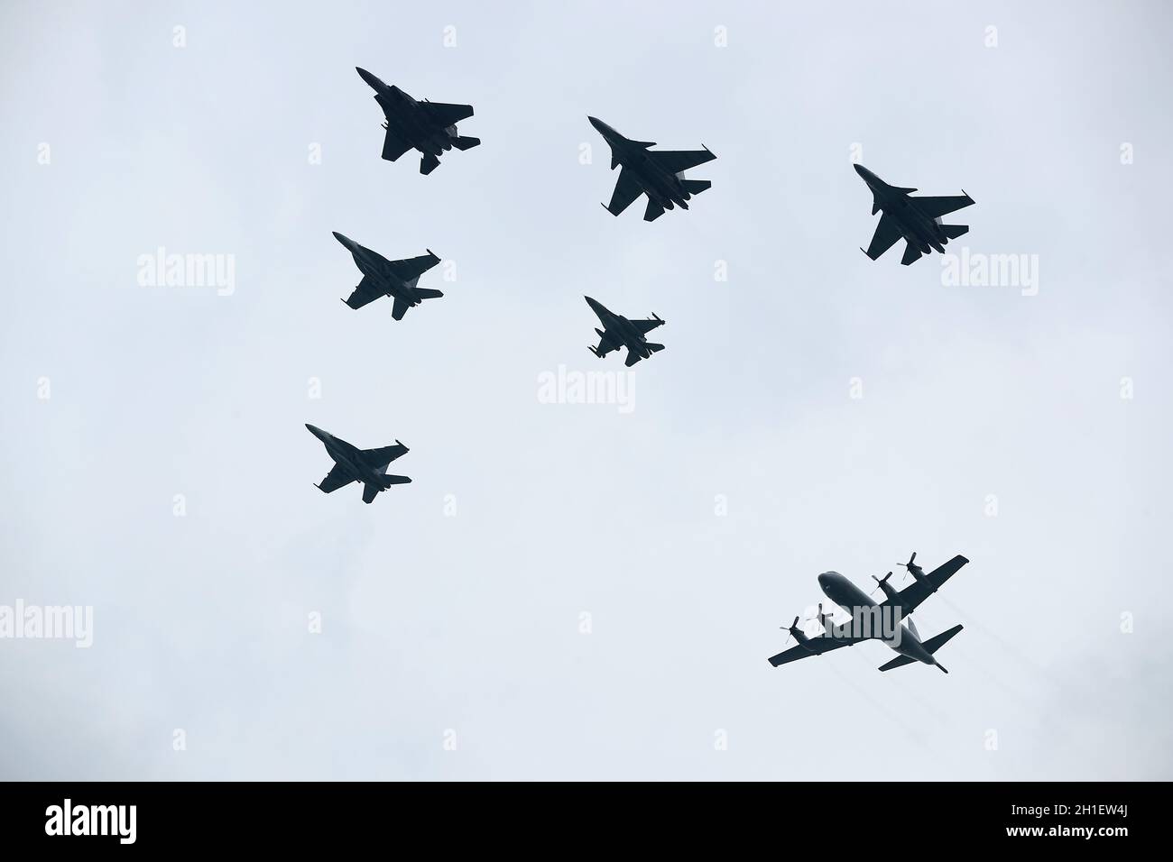 One F-15SG and one F-16C/D from the Republic of Singapore Air Force ...