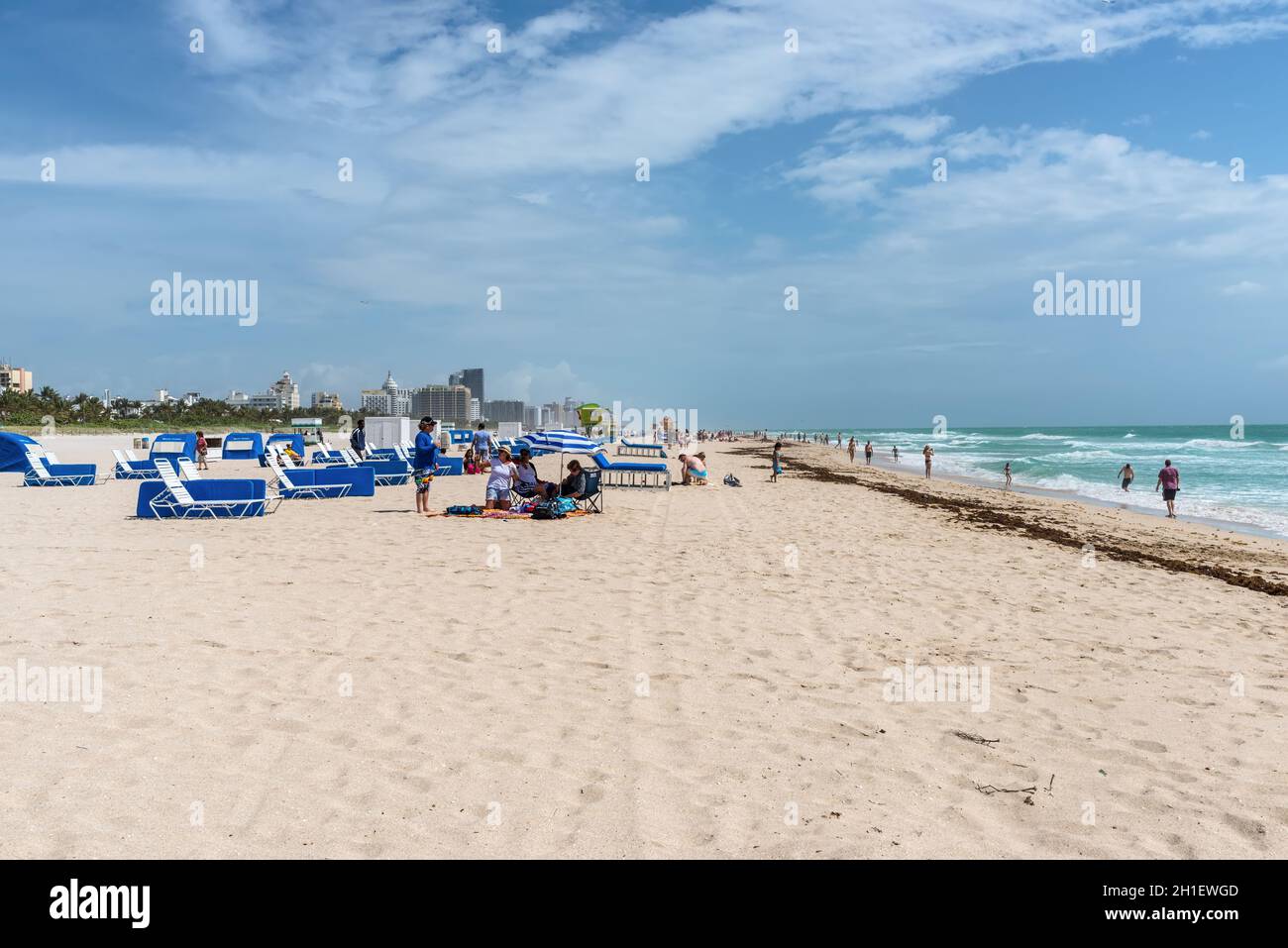 Miami, FL, USA - April 19, 2019: People on beach enjoying sun in South ...