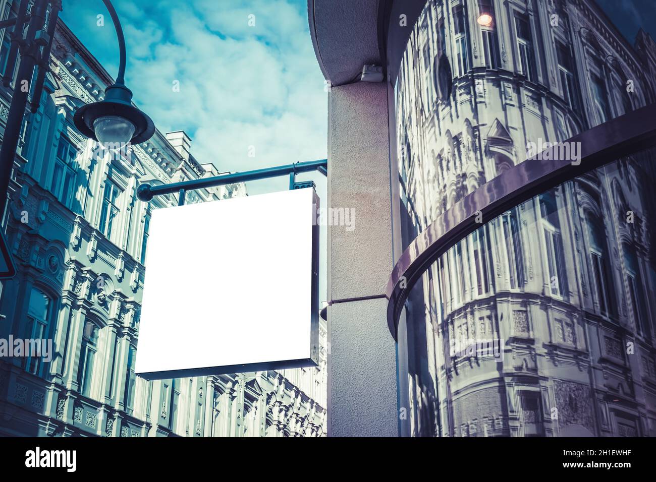 Mock up. Blank white rectangular shape signboard on the wall of ...