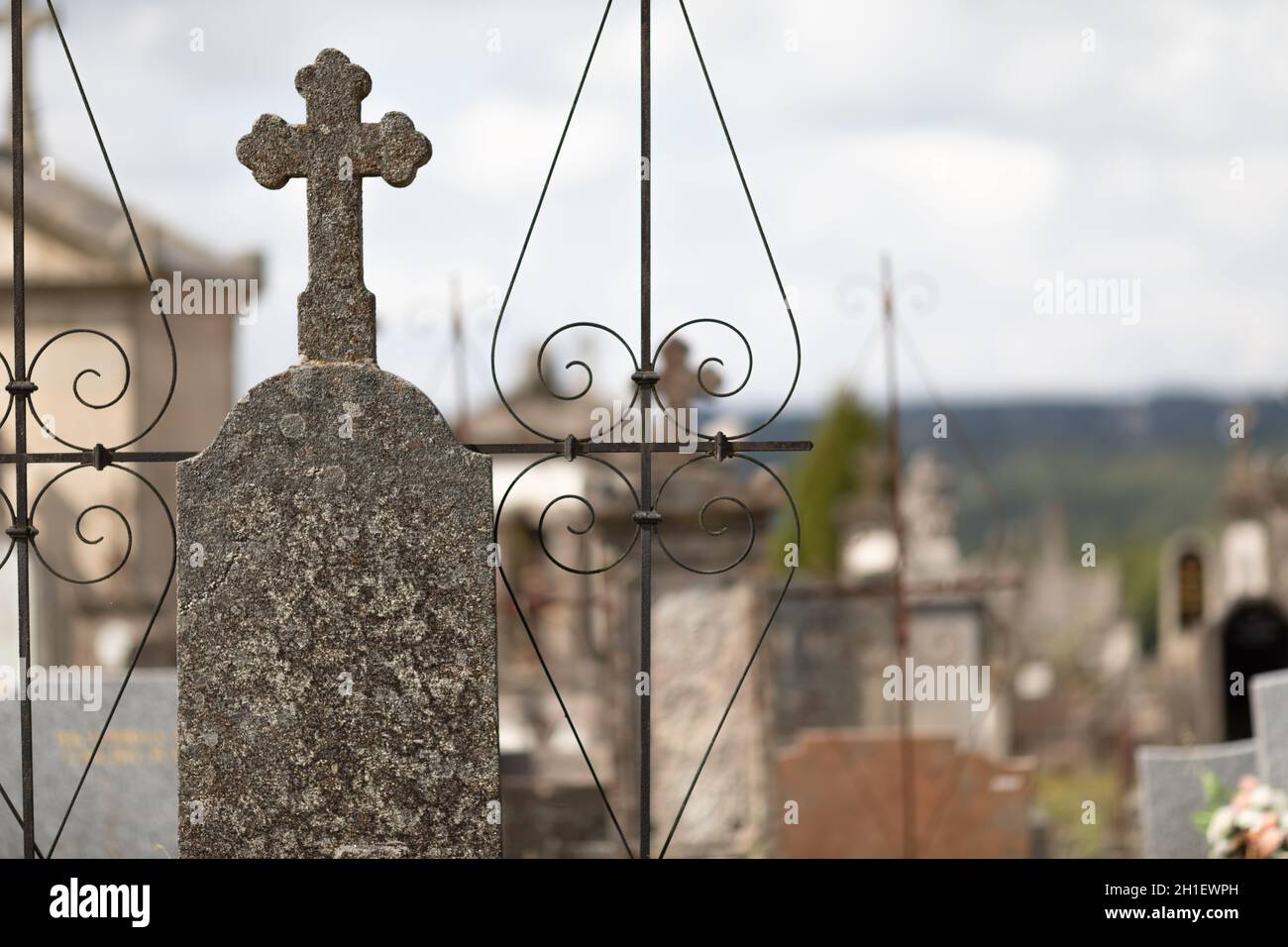 Selective focus shot of gravestones in the cemetery Stock Photo - Alamy