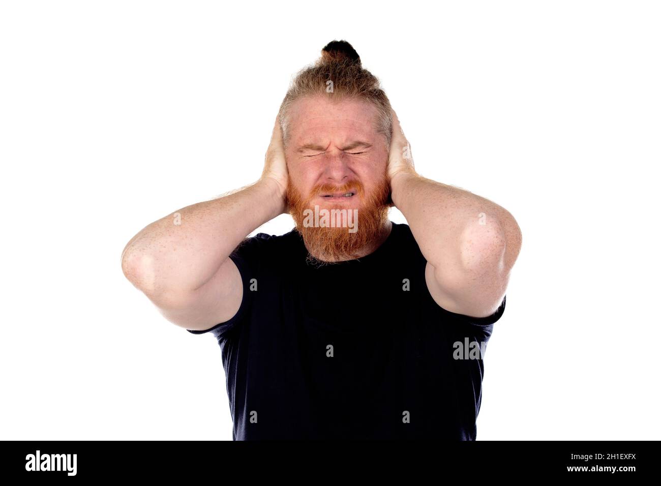 Red haired man with long beard covering his ears isolated on a white ...