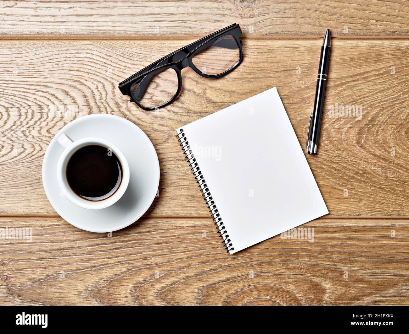 coffee cup note book table paper Stock Photo - Alamy