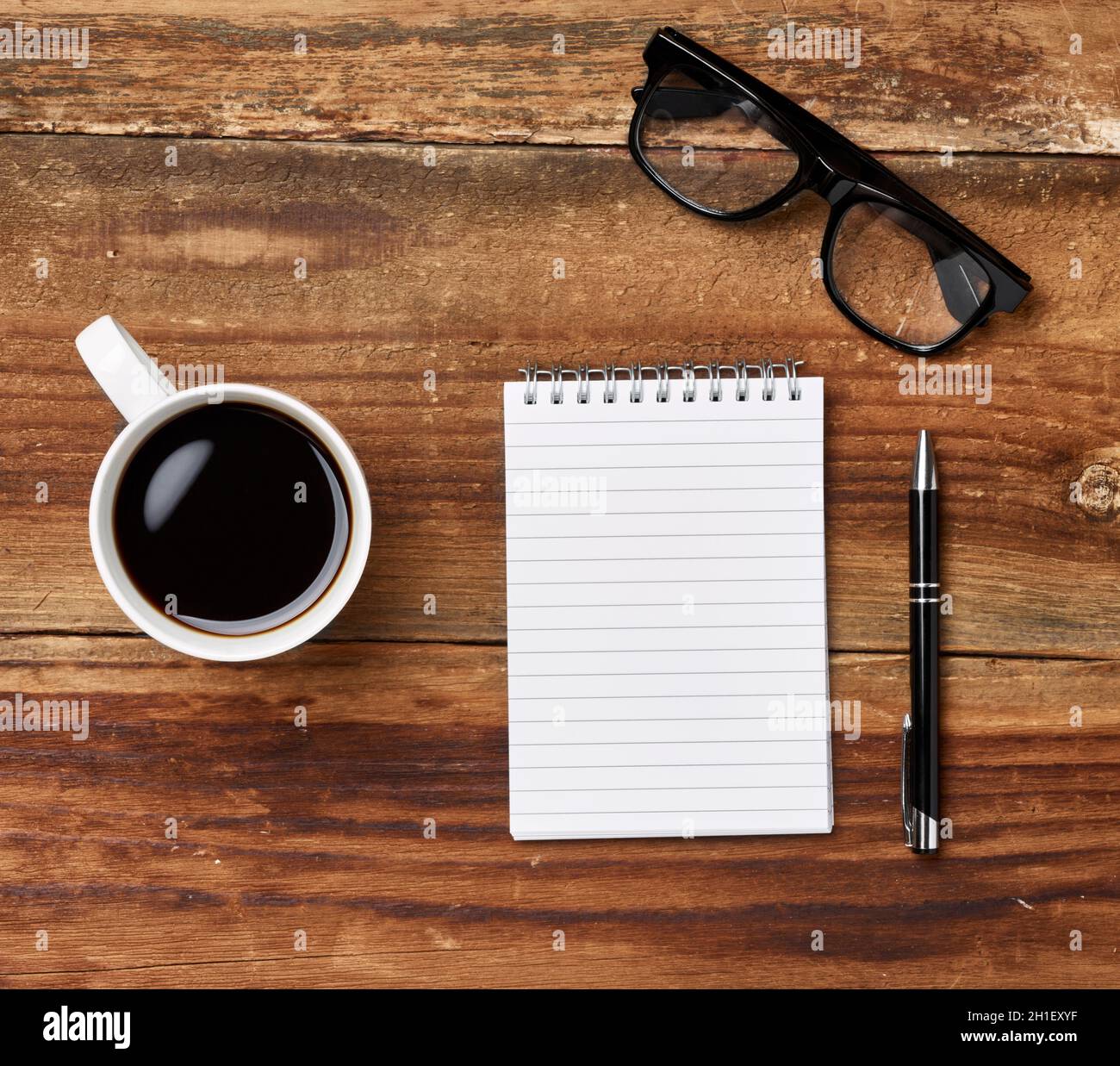 coffee cup note book table paper Stock Photo - Alamy