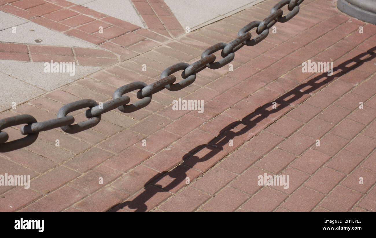 Chain in the street Stock Photo - Alamy