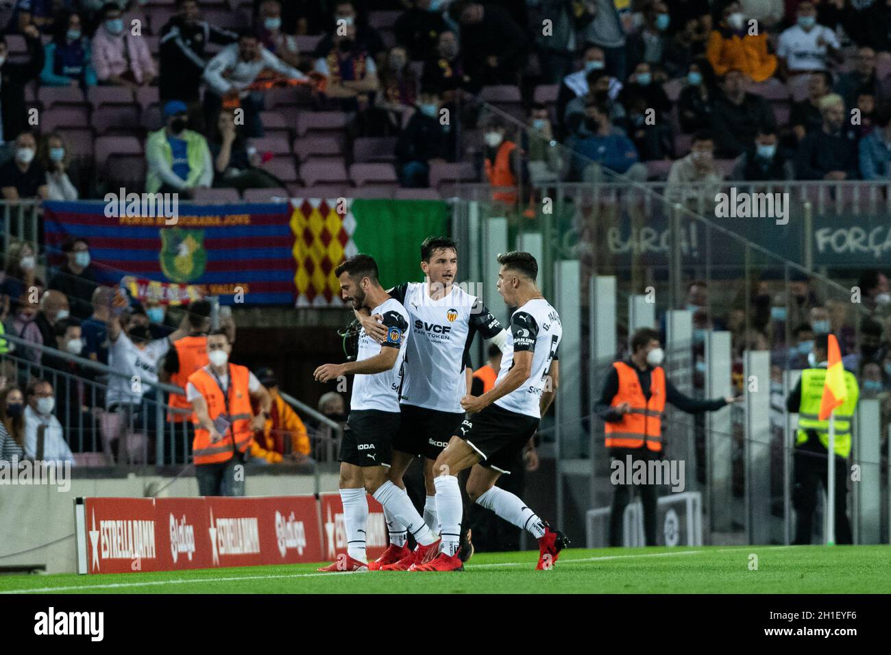 Jose Luis Gaya of Valencia celebrates a goal with teammates during the ...