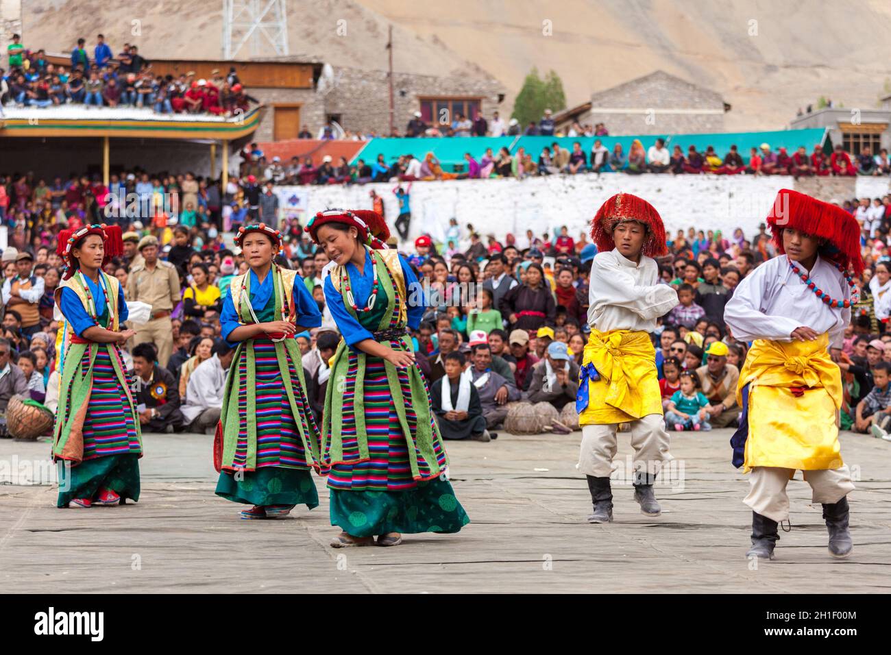 LEH, INDIA - SEPTEMBER 08, 2012: Young dancers in traditional Ladakhi ...