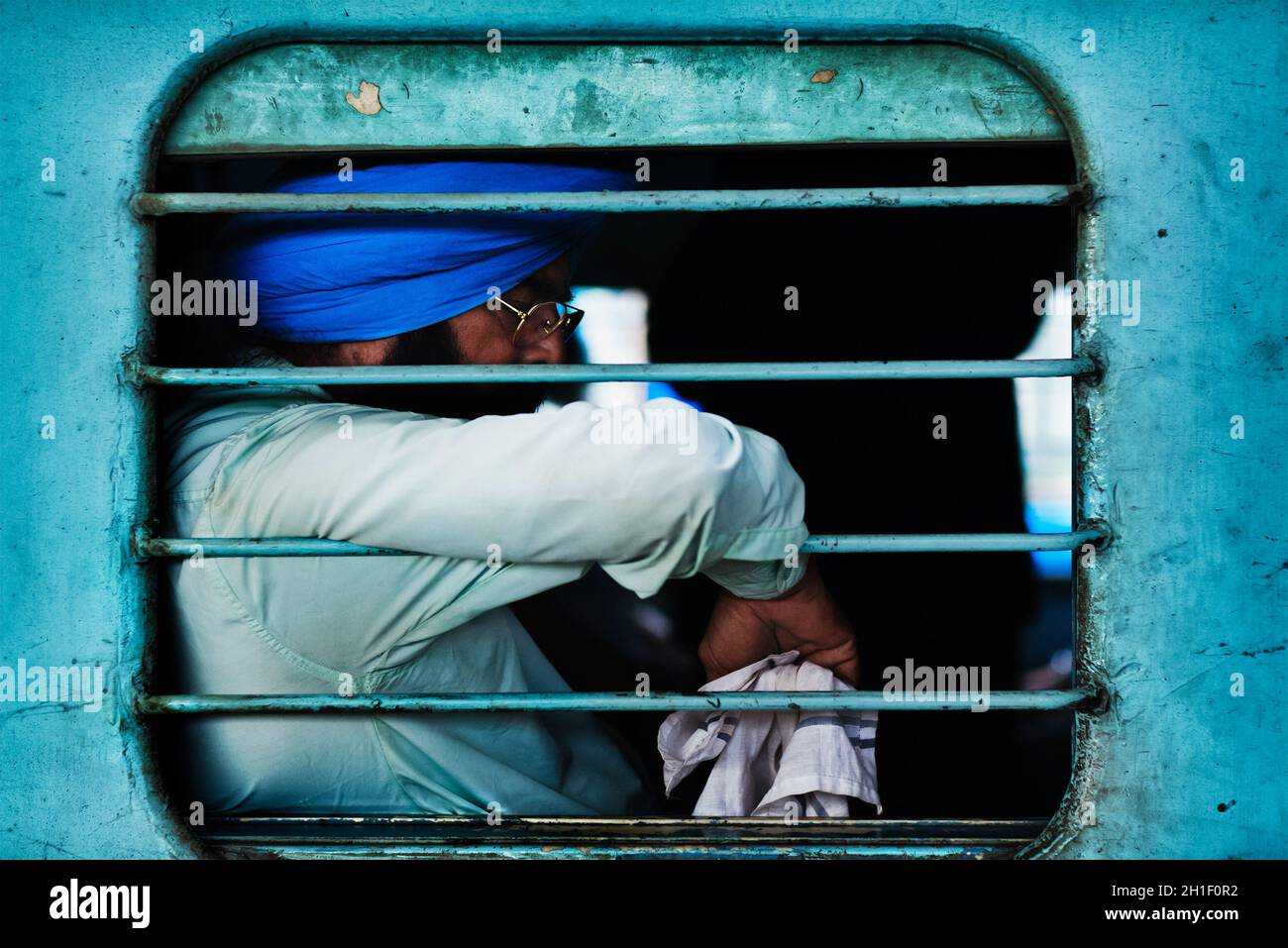 AMRITSAR, INDIA - AUGUST 26, 2011: Sikh man in train window. Indian ...