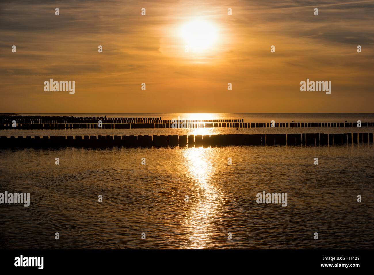 Sunset on the beach of Ahrenshoop in Germany Stock Photo - Alamy