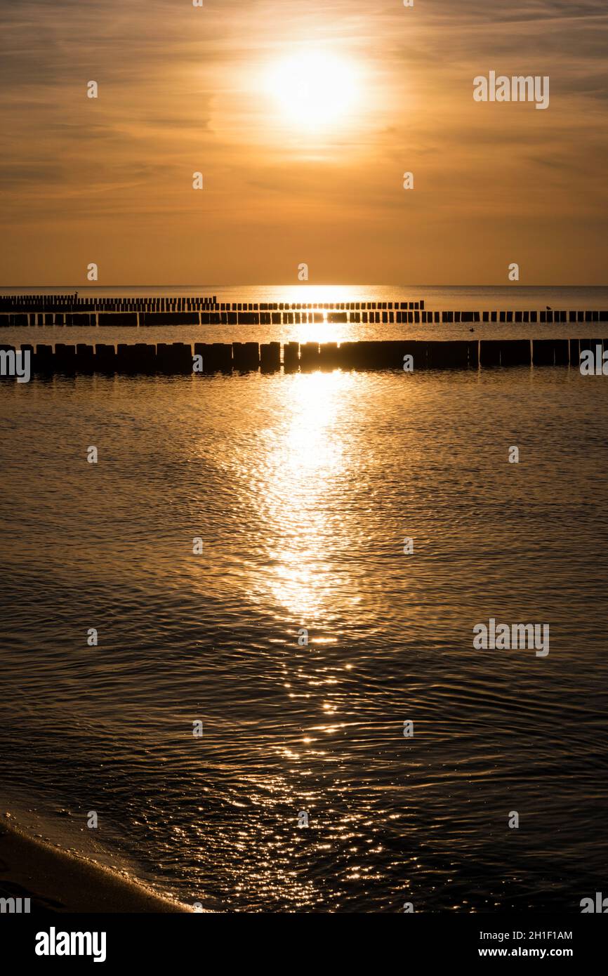 Sunset on the beach of Ahrenshoop in Germany Stock Photo - Alamy