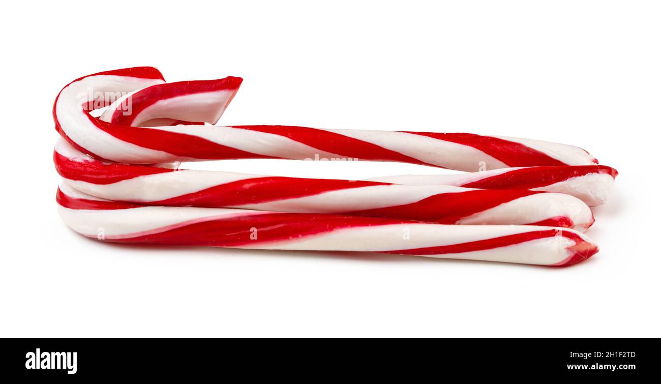 Stack of candy canes isolated on white background Stock Photo - Alamy
