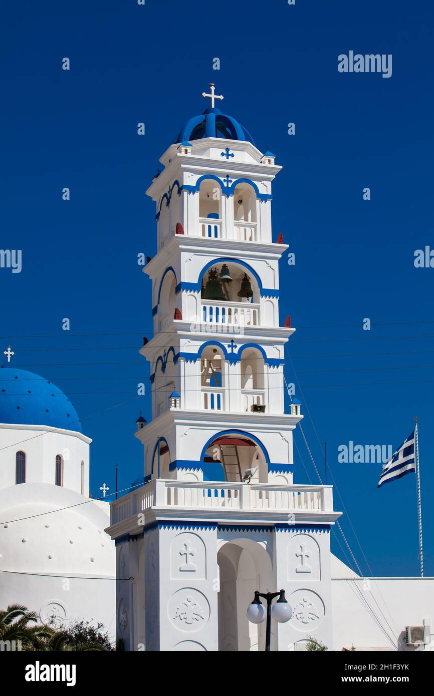 The Church of Holy Cross in the central square of Perissa on Santorini ...