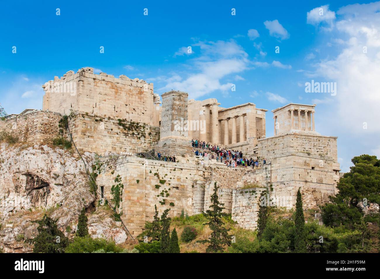 ATHENS, GREECE - APRIL, 2018: Tourists visiting the Acropolis in a ...