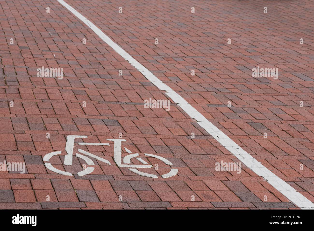 bike lane on road, bike path with pictogram Stock Photo - Alamy