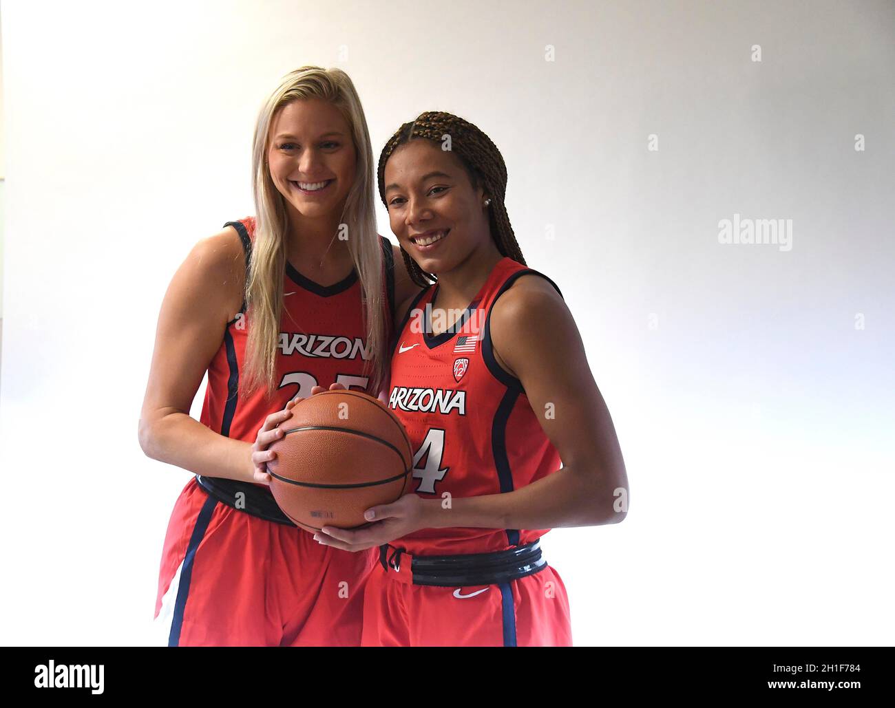 Cate Reese (left) and Sam Thomas (right) posing during Pac-12 women's ...