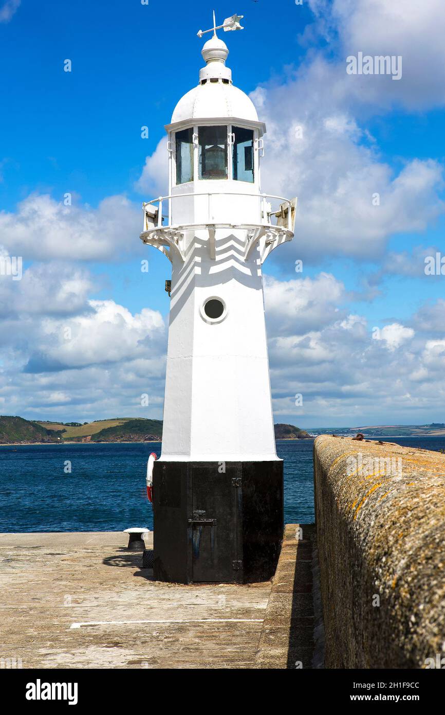 Lighthouse on the outer Harbour Wall at Mevagissey Cornwall England UK ...