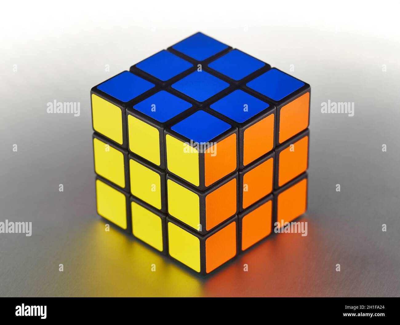 BUDAPEST, HUNGARY - CIRCA 2019: Solved Rubik's cube logic game on shiny ...