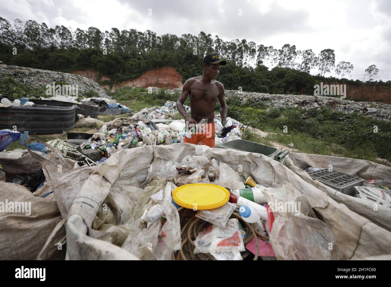 catu, bahia / brazil - may 2, 2019: person is seen collecting material ...