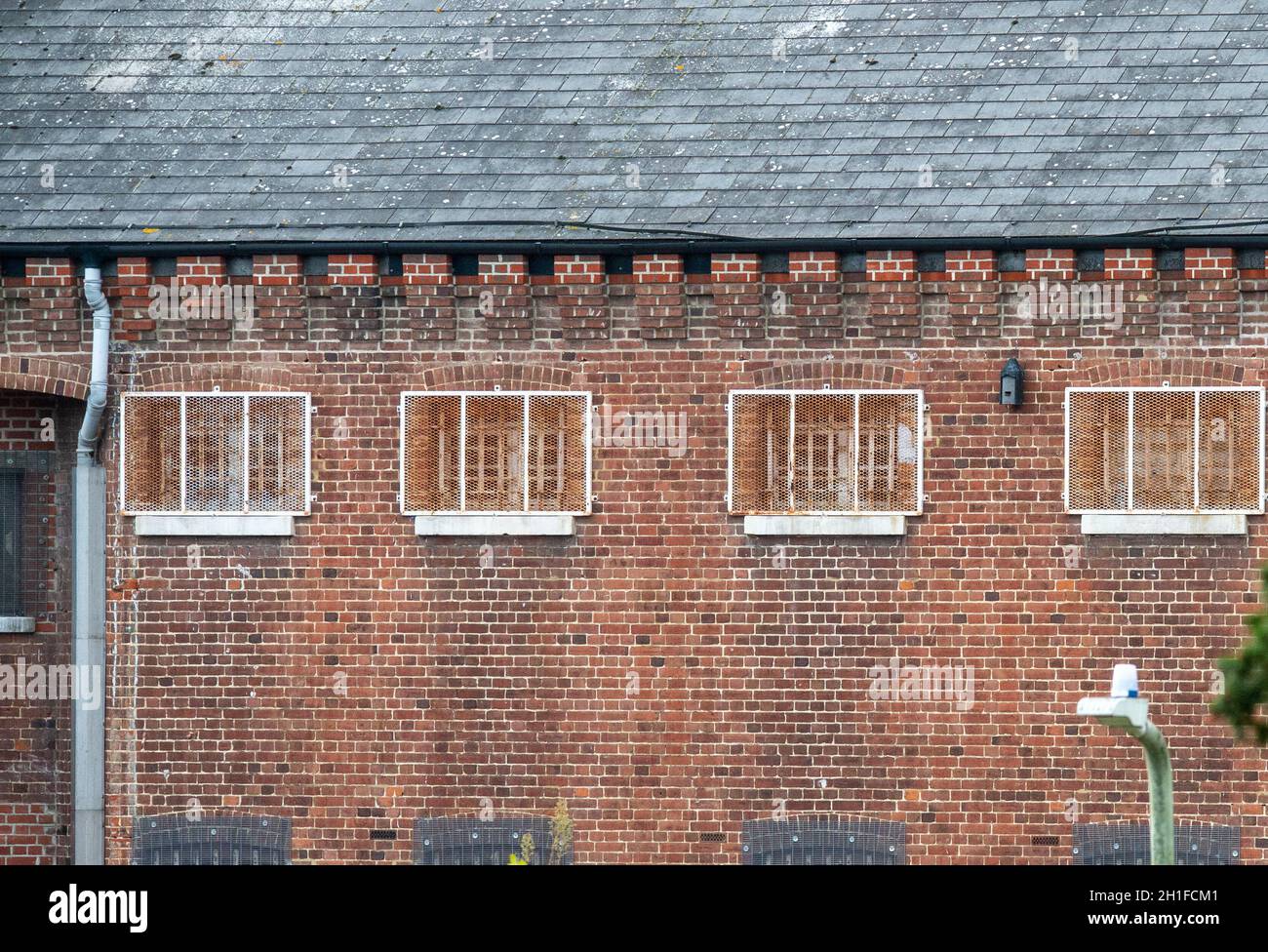 second floor windows of prison Stock Photo - Alamy