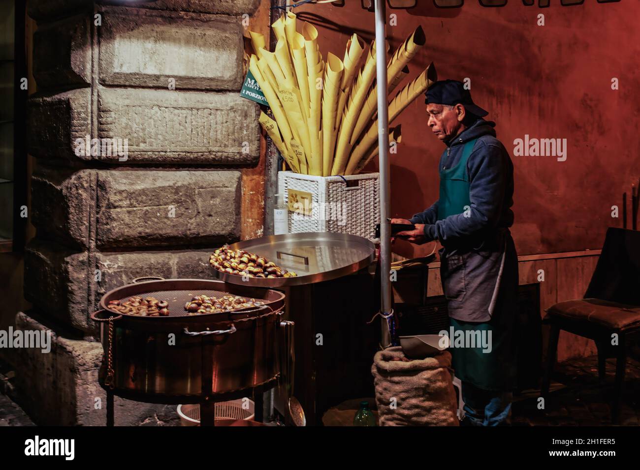 Rome, Italy Roasted chestnuts seller around Trevi Fountain. Night view ...