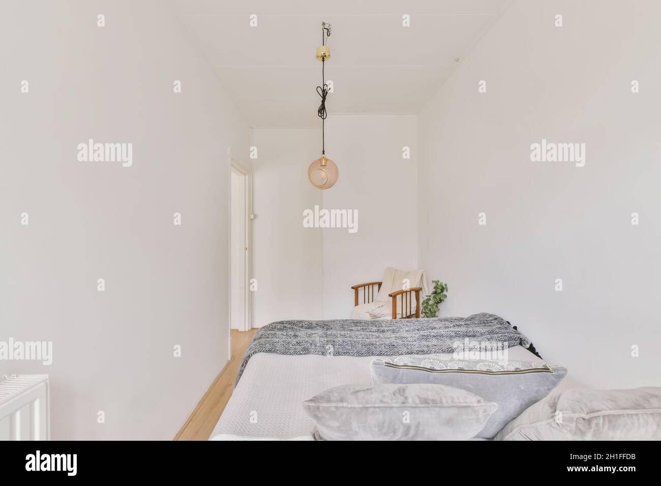 Beautiful simplistic bedroom interior design Stock Photo - Alamy