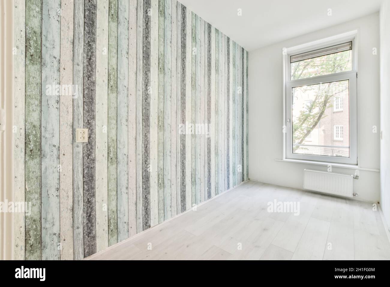 Empty room interior design with striped wallpaper Stock Photo - Alamy