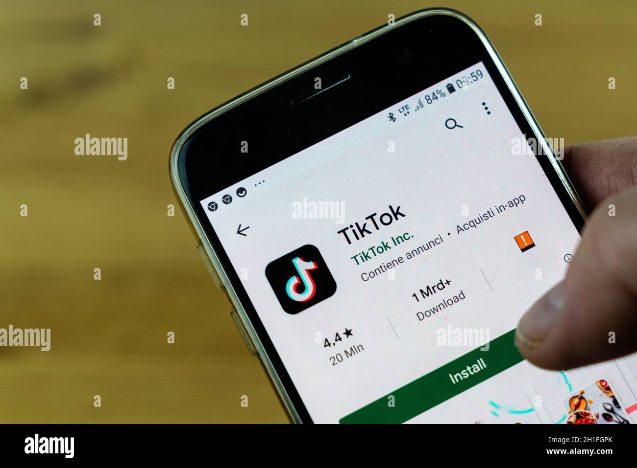 install the Tik Tok app on your mobile Stock Photo - Alamy