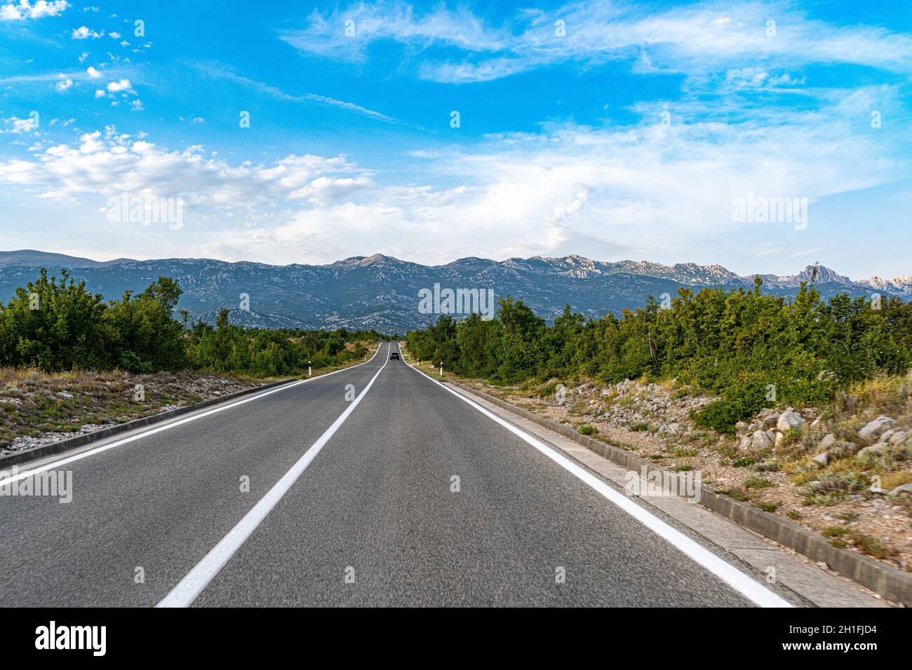 Scenic road. Road is surrounded by a magnificent natural landscape ...