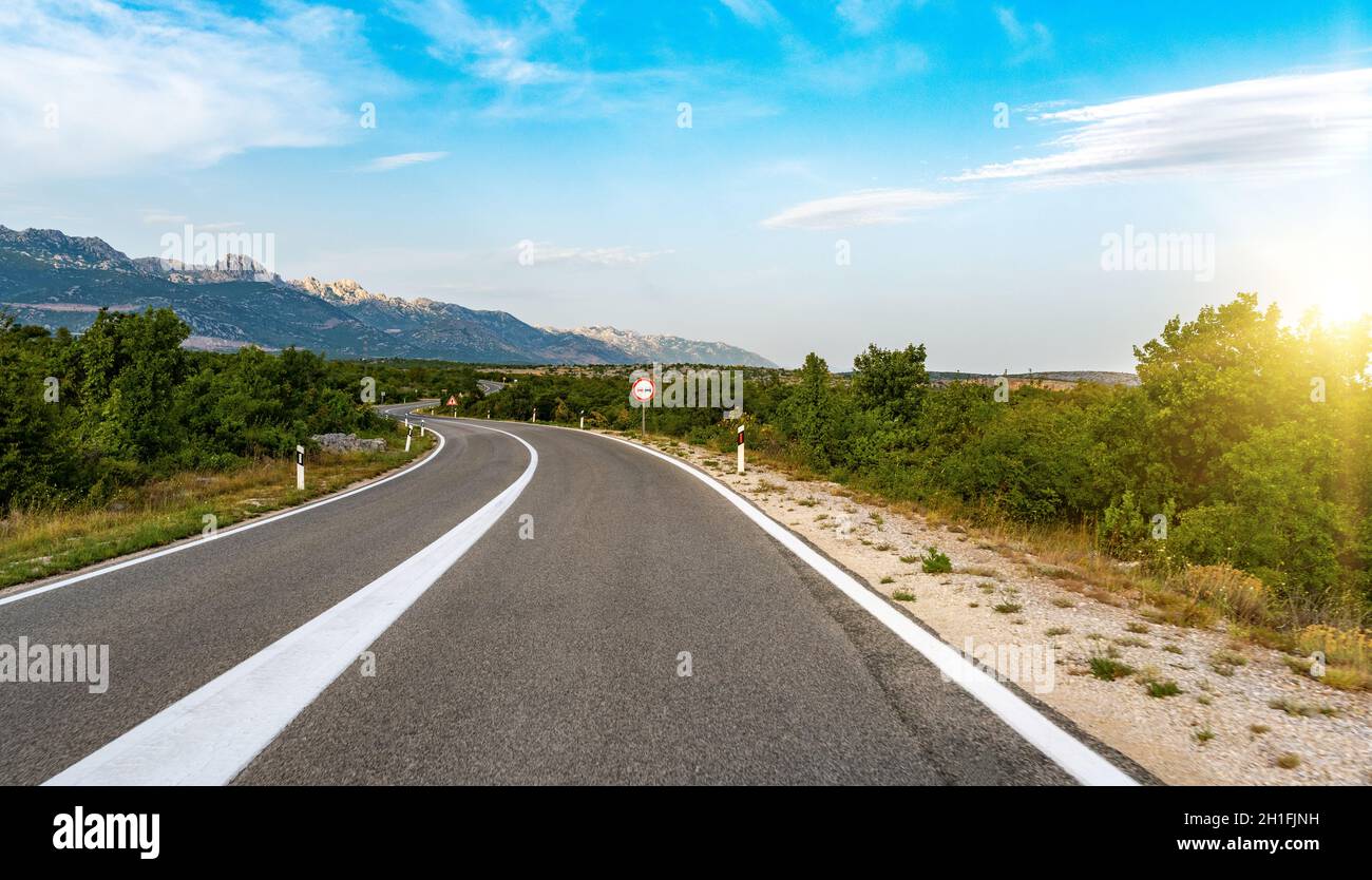 Scenic road. Road is surrounded by a magnificent natural landscape ...