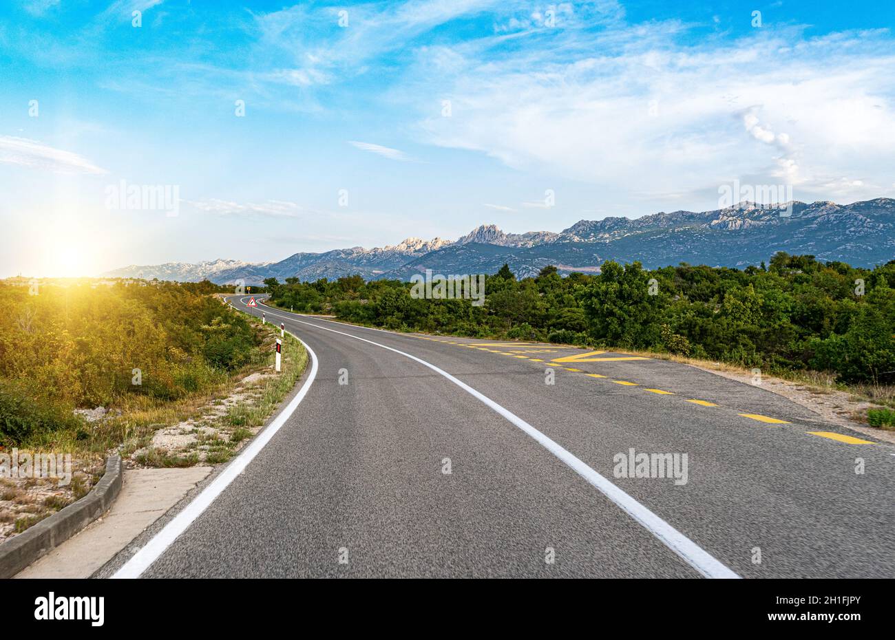 Scenic road. Road is surrounded by a magnificent natural landscape ...