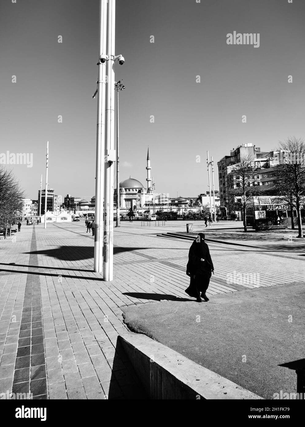 Black and white photo of istanbul taksim square. Black clothes women ...