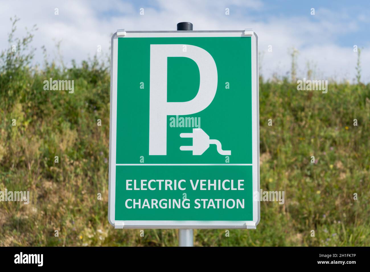 Electric vehicle charging station parking sign Stock Photo - Alamy