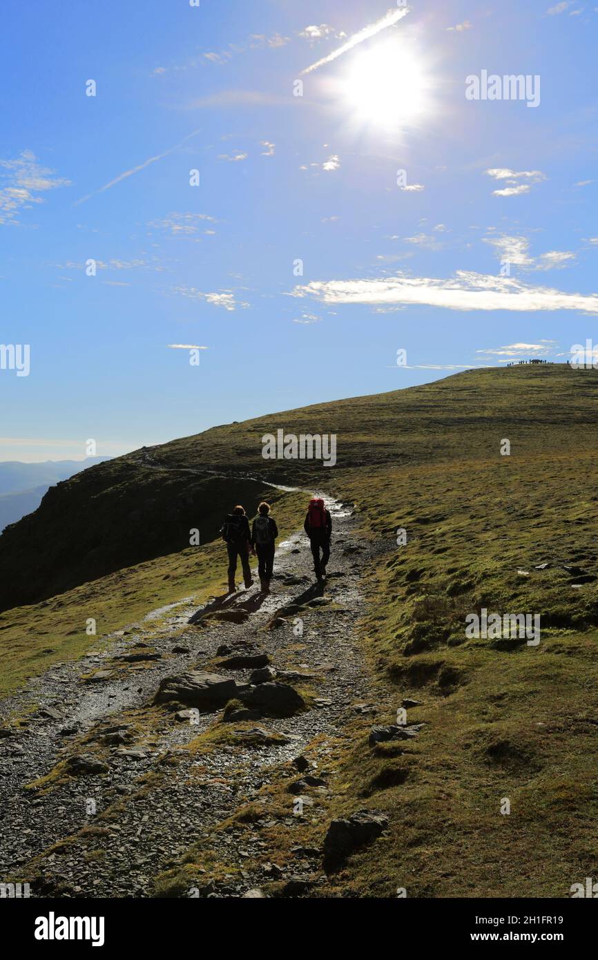 Walkers on the summit ridge of Blencathra fell, Lake District National ...