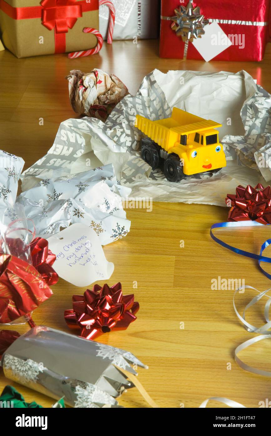 Unwrapped present toy hi-res stock photography and images - Alamy