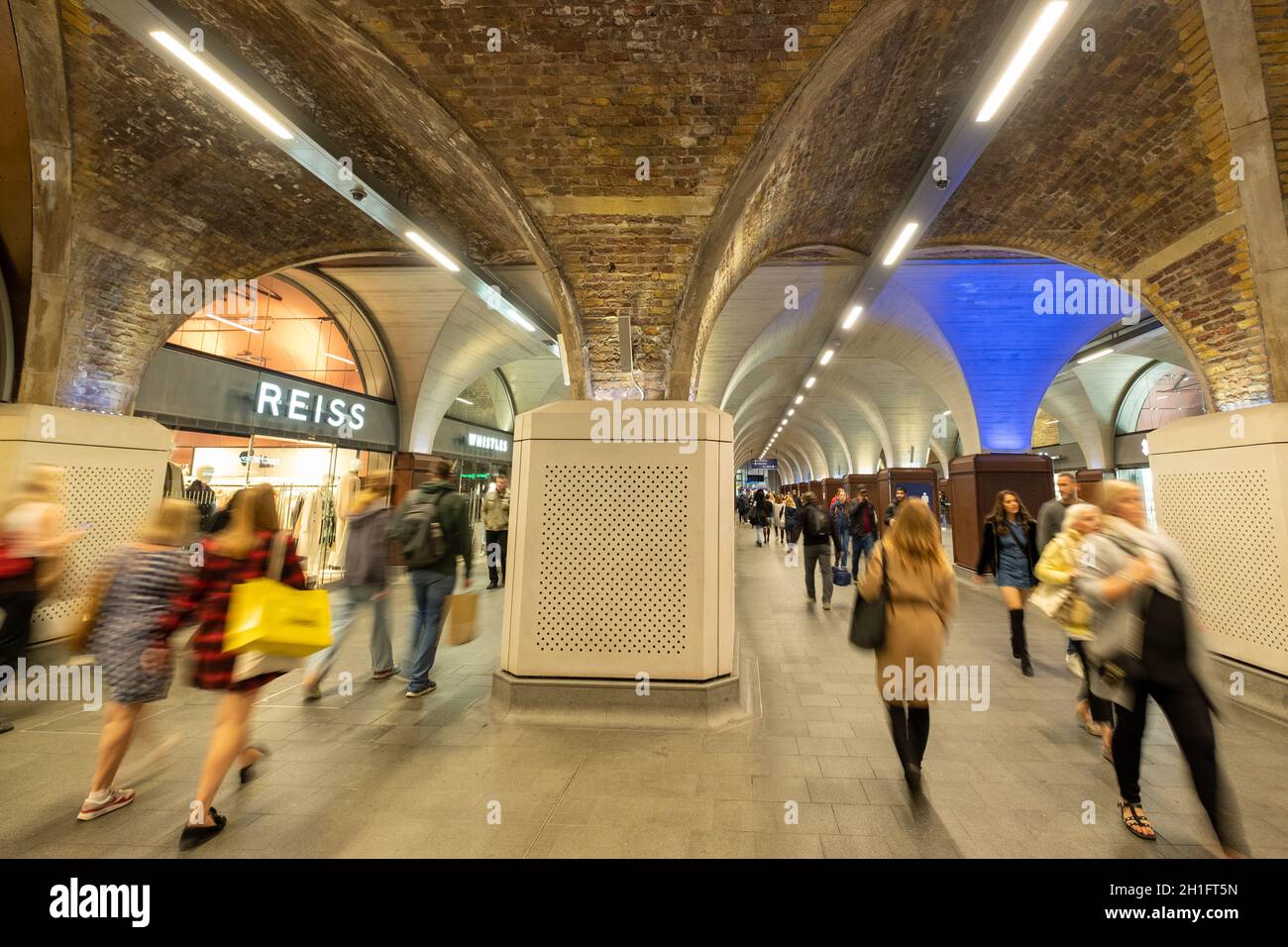 London October, 2021: London Bridge Station walkway with shops and ...