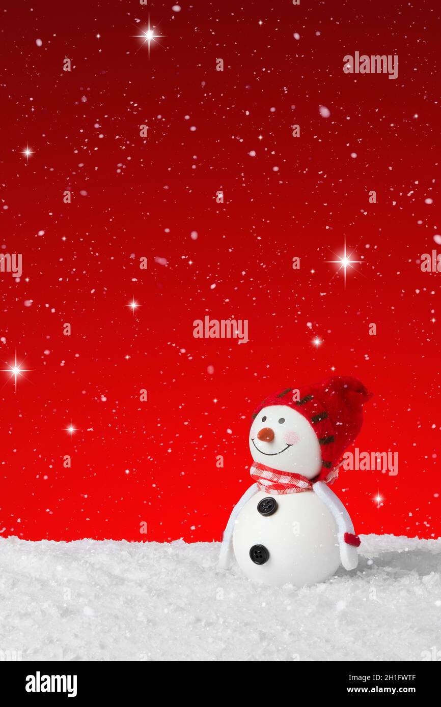 Falling snow on snowman hi-res stock photography and images - Alamy