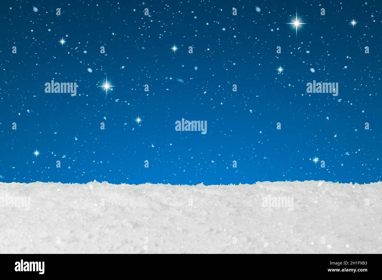 Christmas concept showing snow falling and stars on a background Stock ...