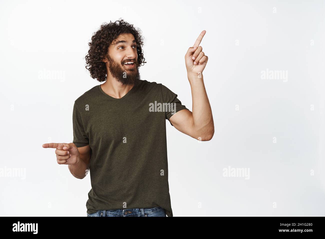 Handsome smiling man pointing sideways, left and right sale banners ...
