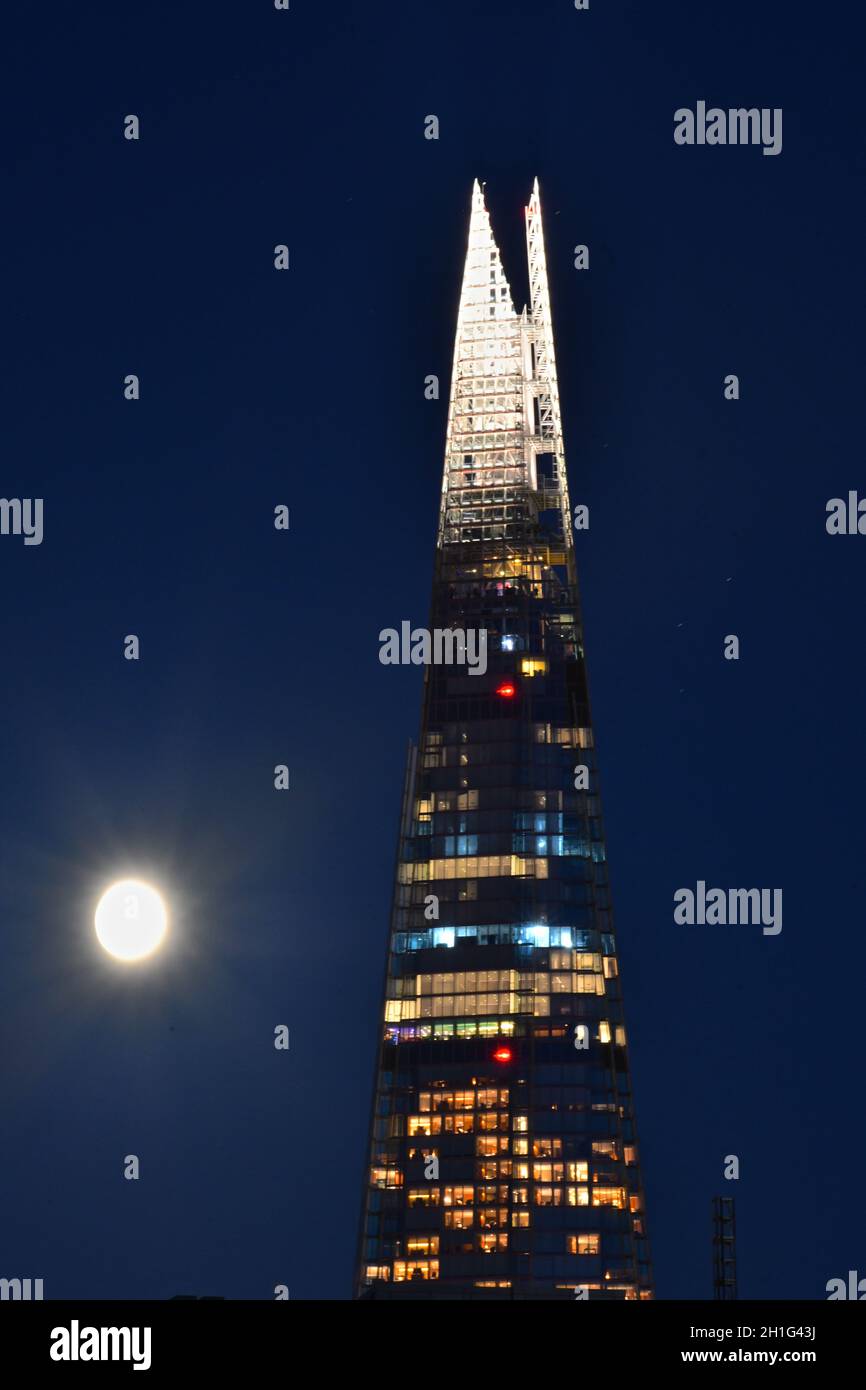 The Shard at night with full moon Stock Photo - Alamy