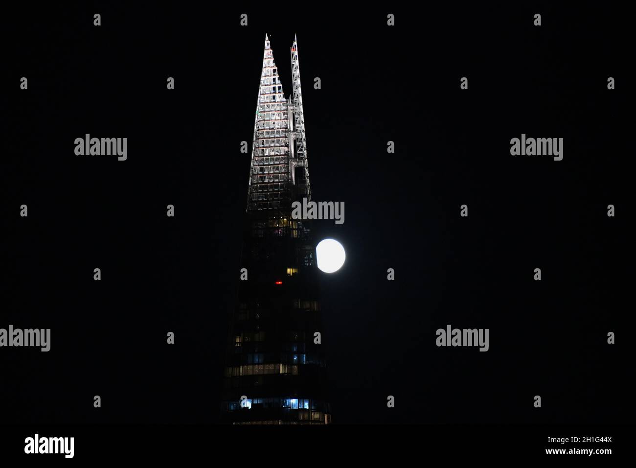 The Shard at night with full moon Stock Photo - Alamy